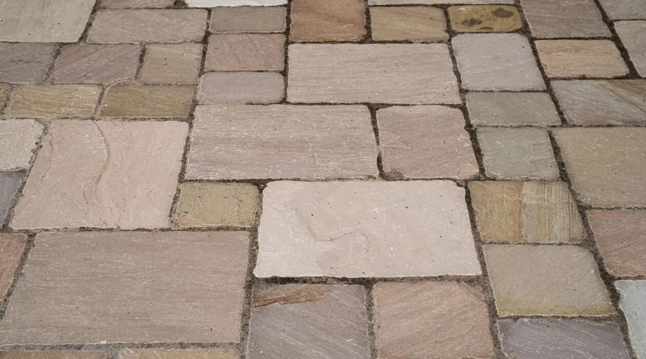 Raj Green Indian Sandstone Tumbled Cobble Paving from Stoneworld