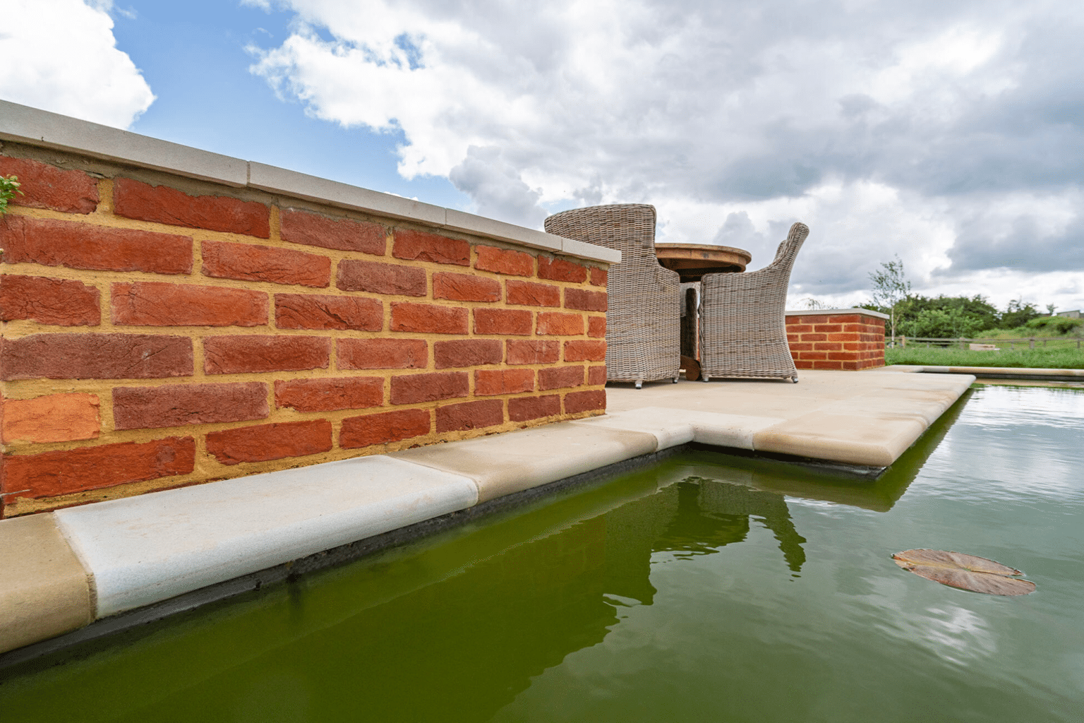Raised Flower Bed With Milton Sandstone Coping - Stoneworld